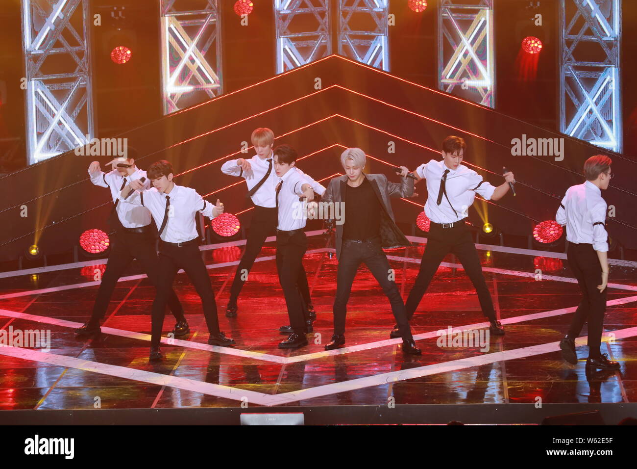 Members of South Korean band MONSTA X perform during the South Korean ...