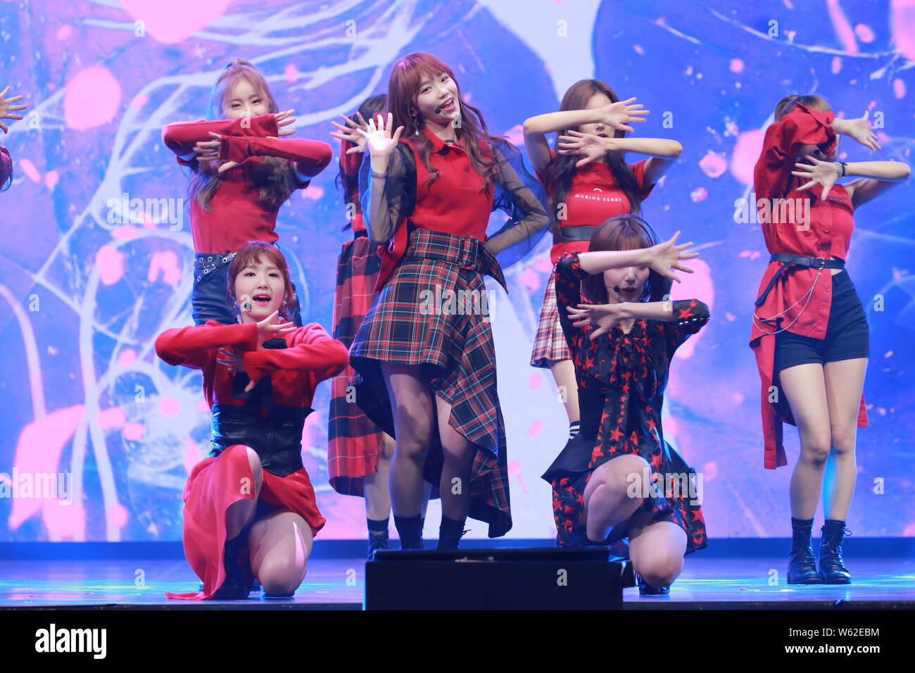 Members of South Korean girl group Izone, stylized as IZ*ONE, perform ...