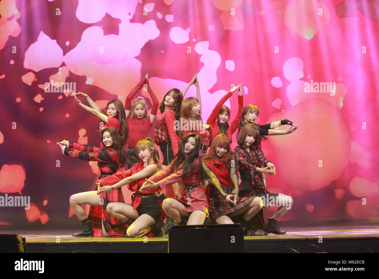 Members of South Korean girl group Izone, stylized as IZ*ONE, perform ...