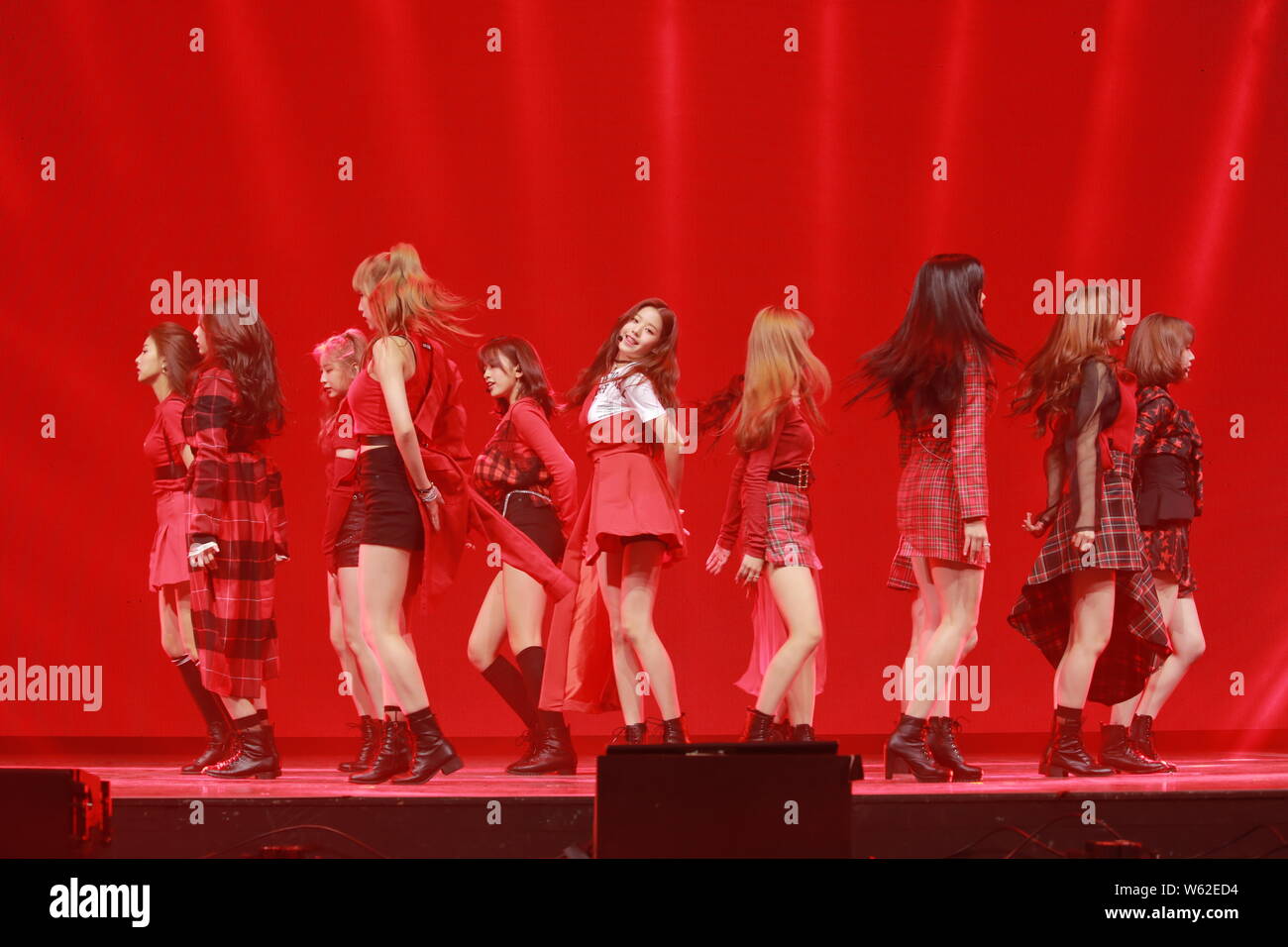 Members of South Korean girl group Izone, stylized as IZ*ONE, perform ...