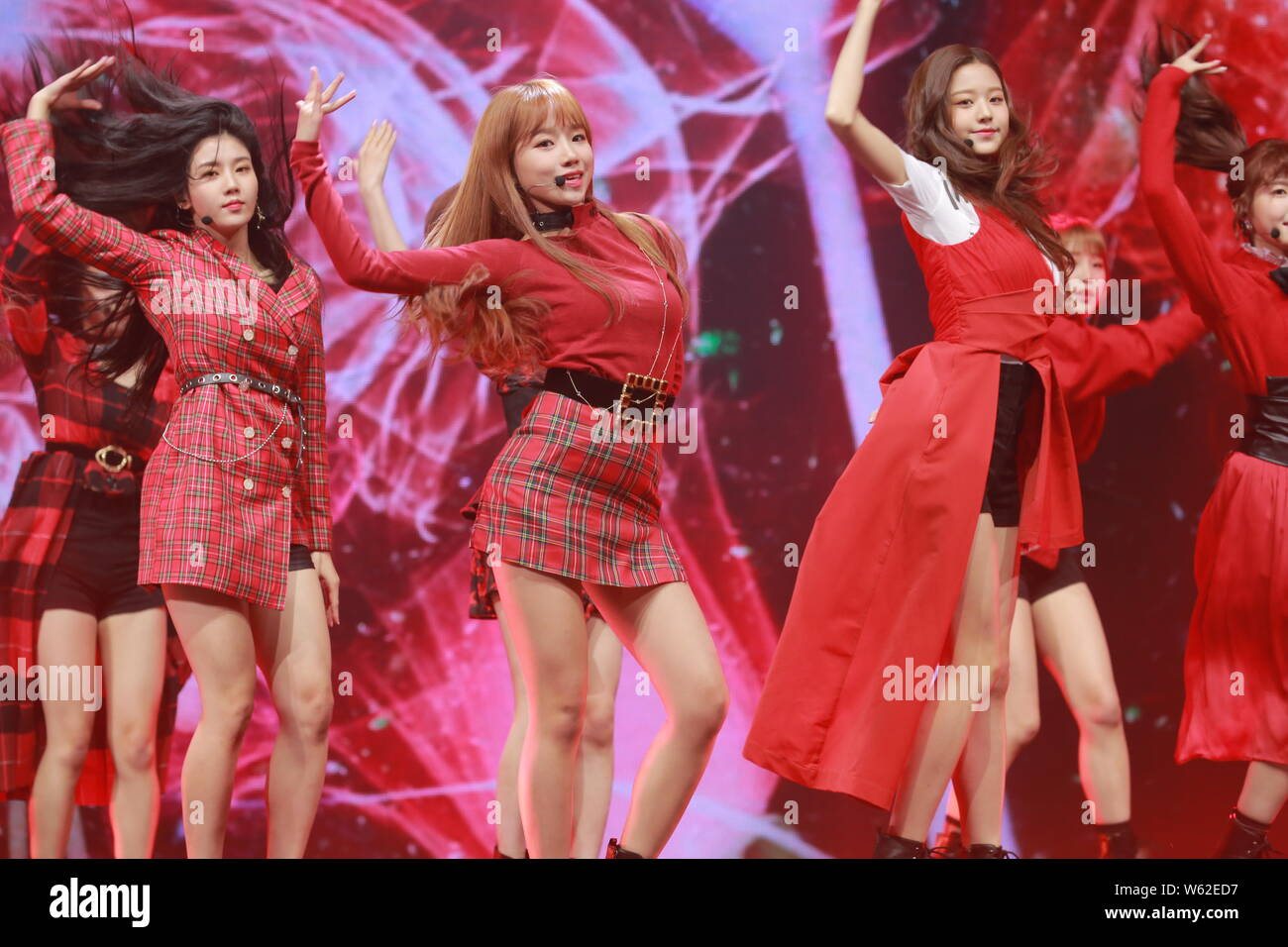 Members of South Korean girl group Izone, stylized as IZ*ONE, perform ...