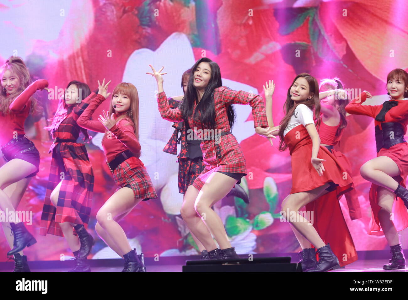 Members of South Korean girl group Izone, stylized as IZ*ONE, perform ...