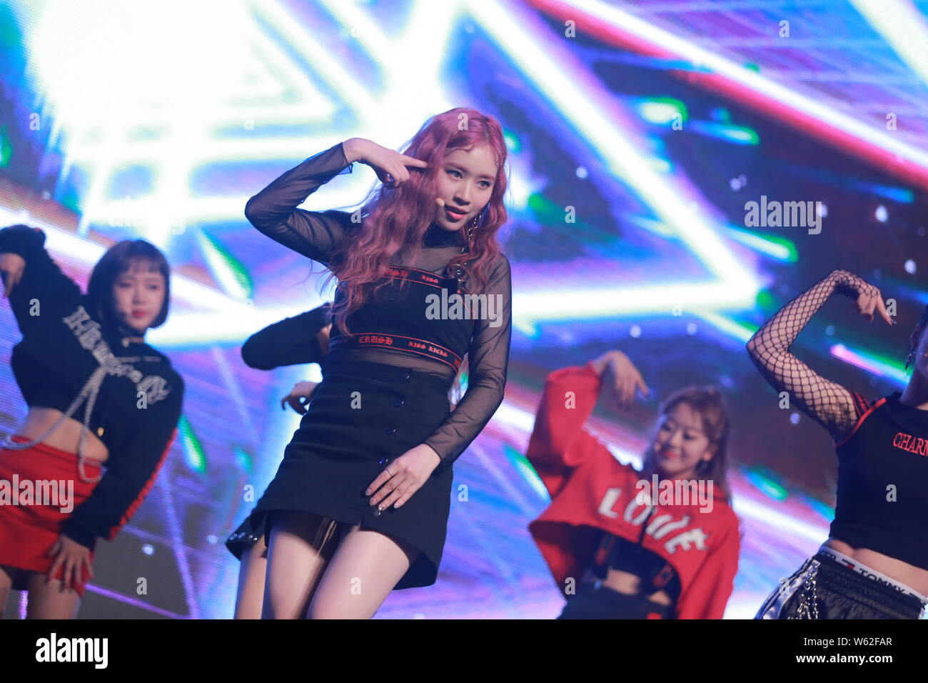 Members of South Korean girl group Weki Meki perform during a showcase ...