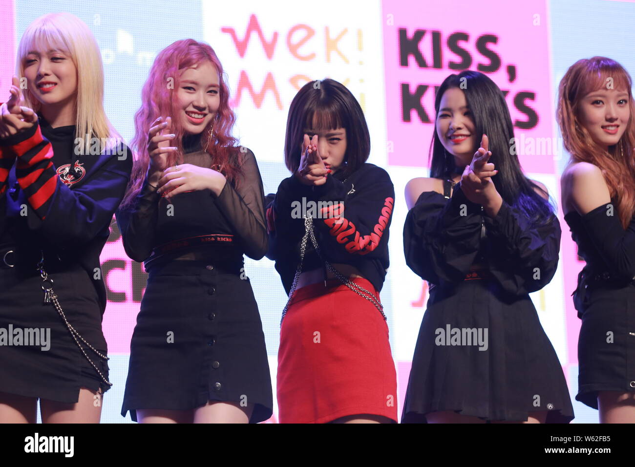 Members of South Korean girl group Weki Meki perform during a showcase ...