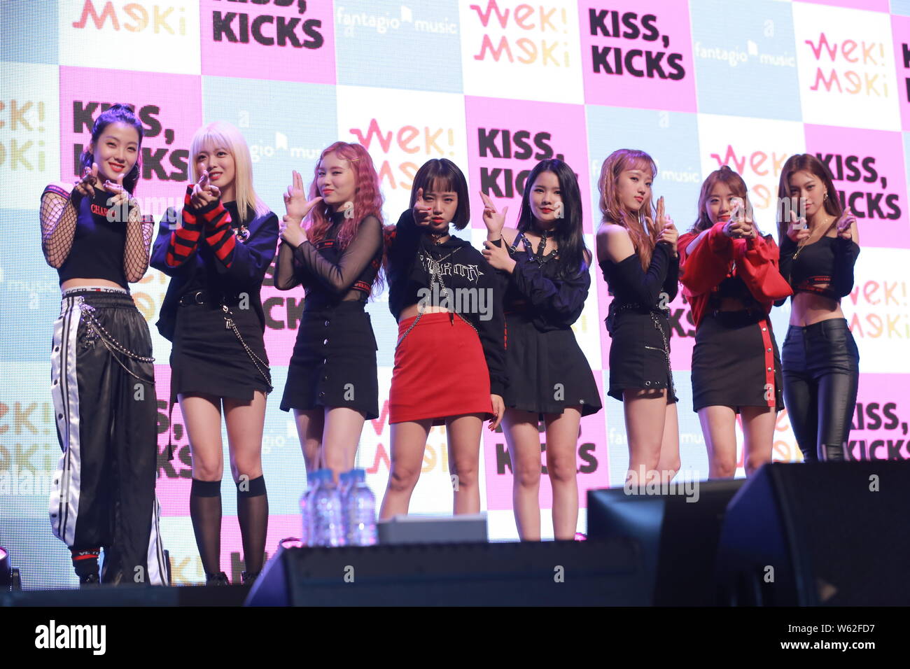 Members of South Korean girl group Weki Meki perform during a showcase ...