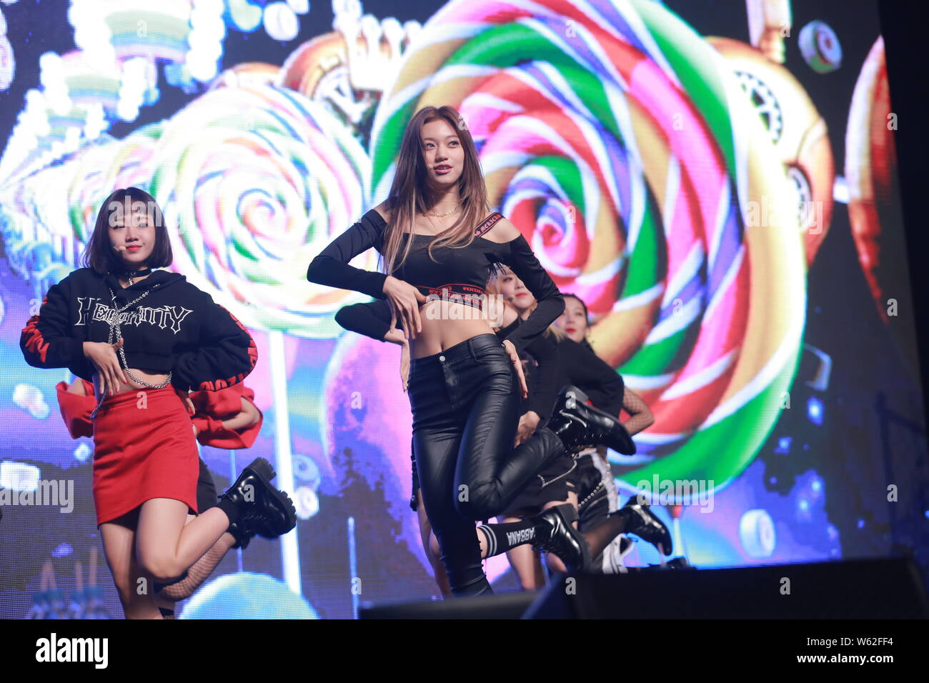 Members of South Korean girl group Weki Meki perform during a showcase ...