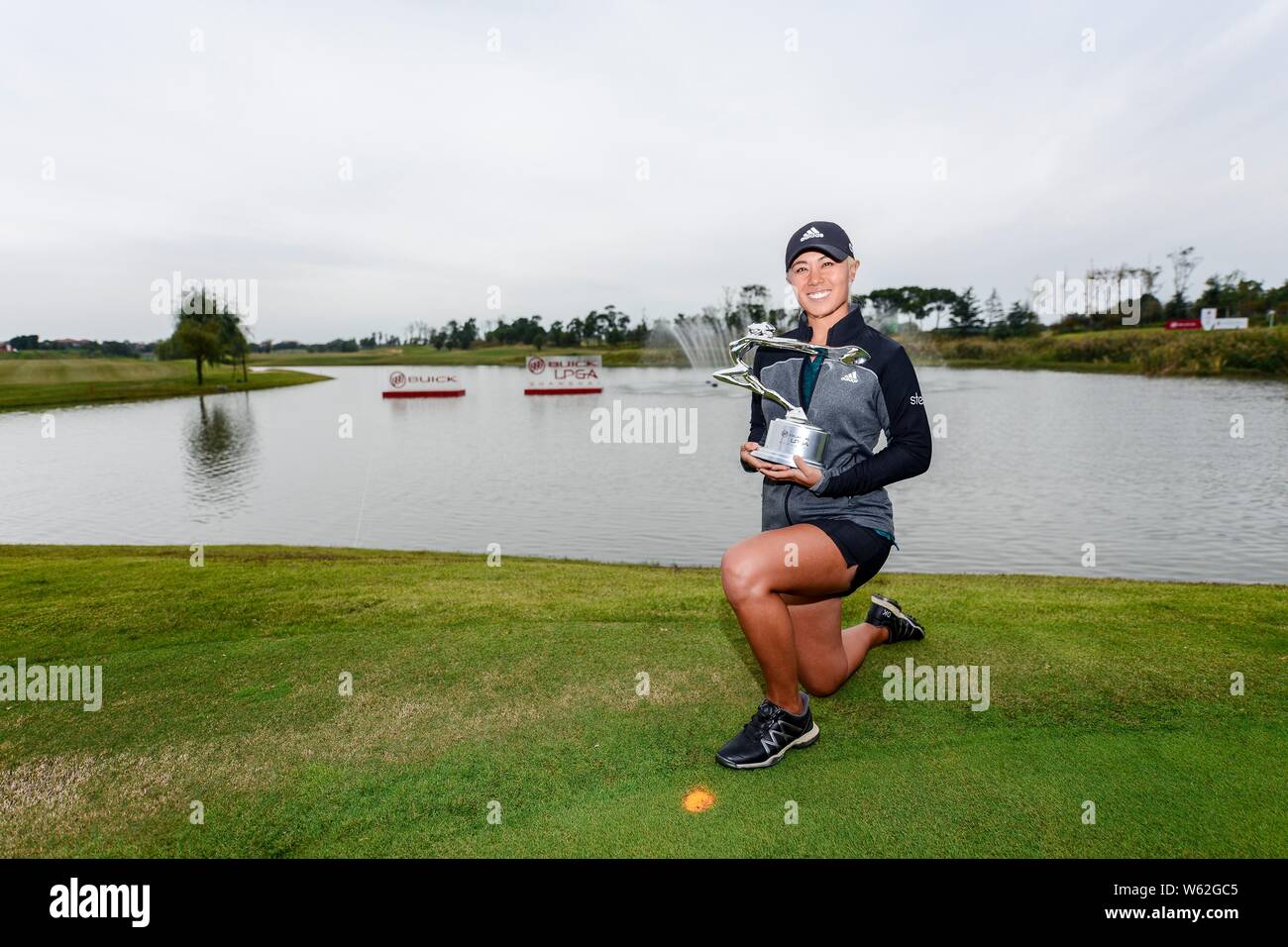 Danielle Kang of the United States poses with her trophy after winning ...