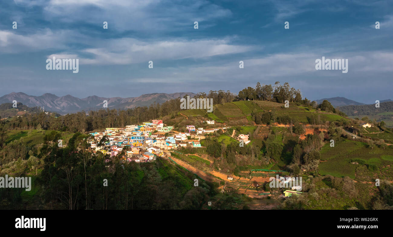 small village on hill top with green forest of western ghat image is ...