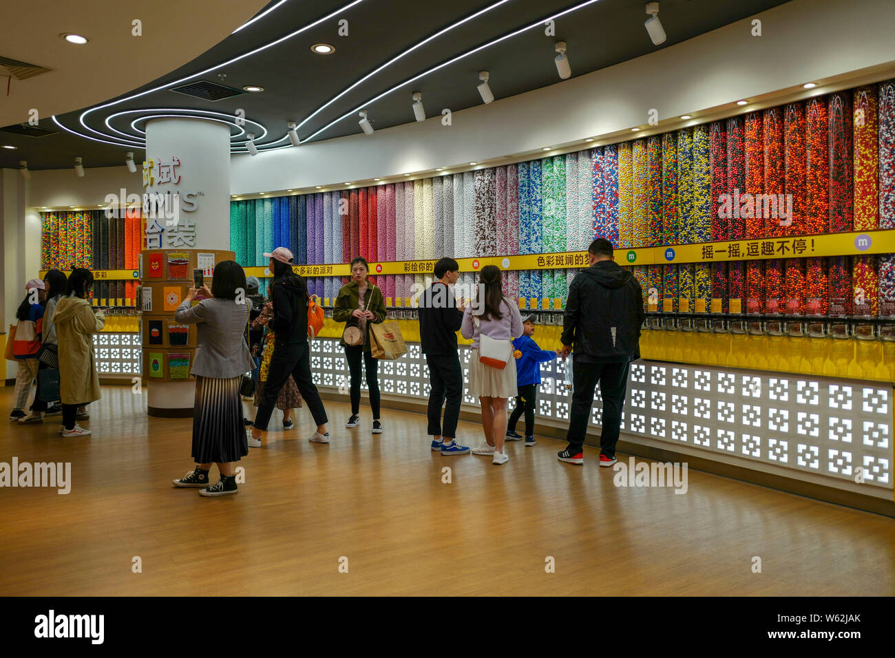 Customers visit the M&M's World flagship store in Shanghai, China, 19 ...