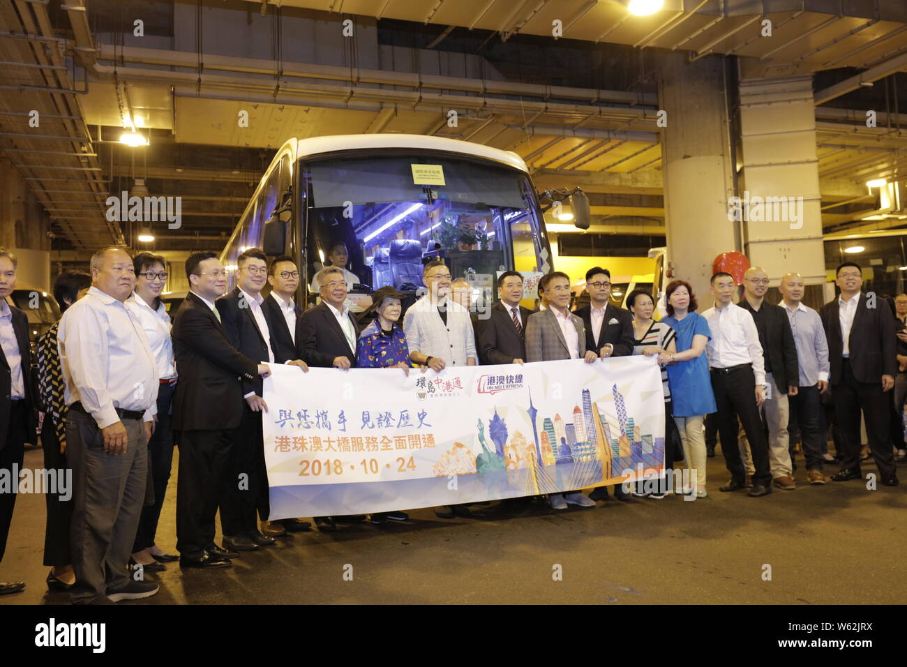 Passengers queue up to take a coach from Kwoon Chung Bus over the world ...