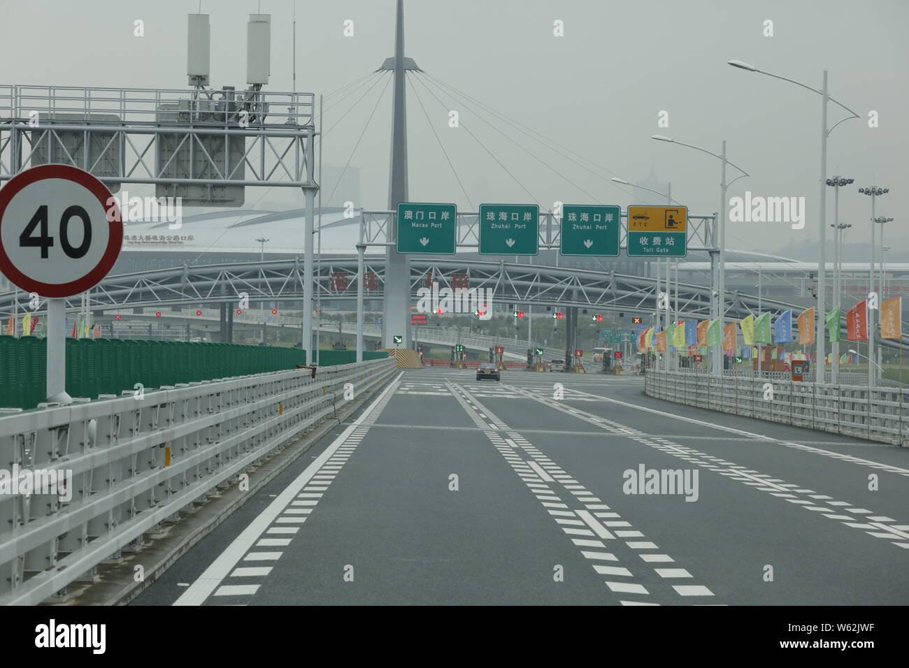 Vehicles travel on the world's longest cross-sea bridge, the Hong Kong ...