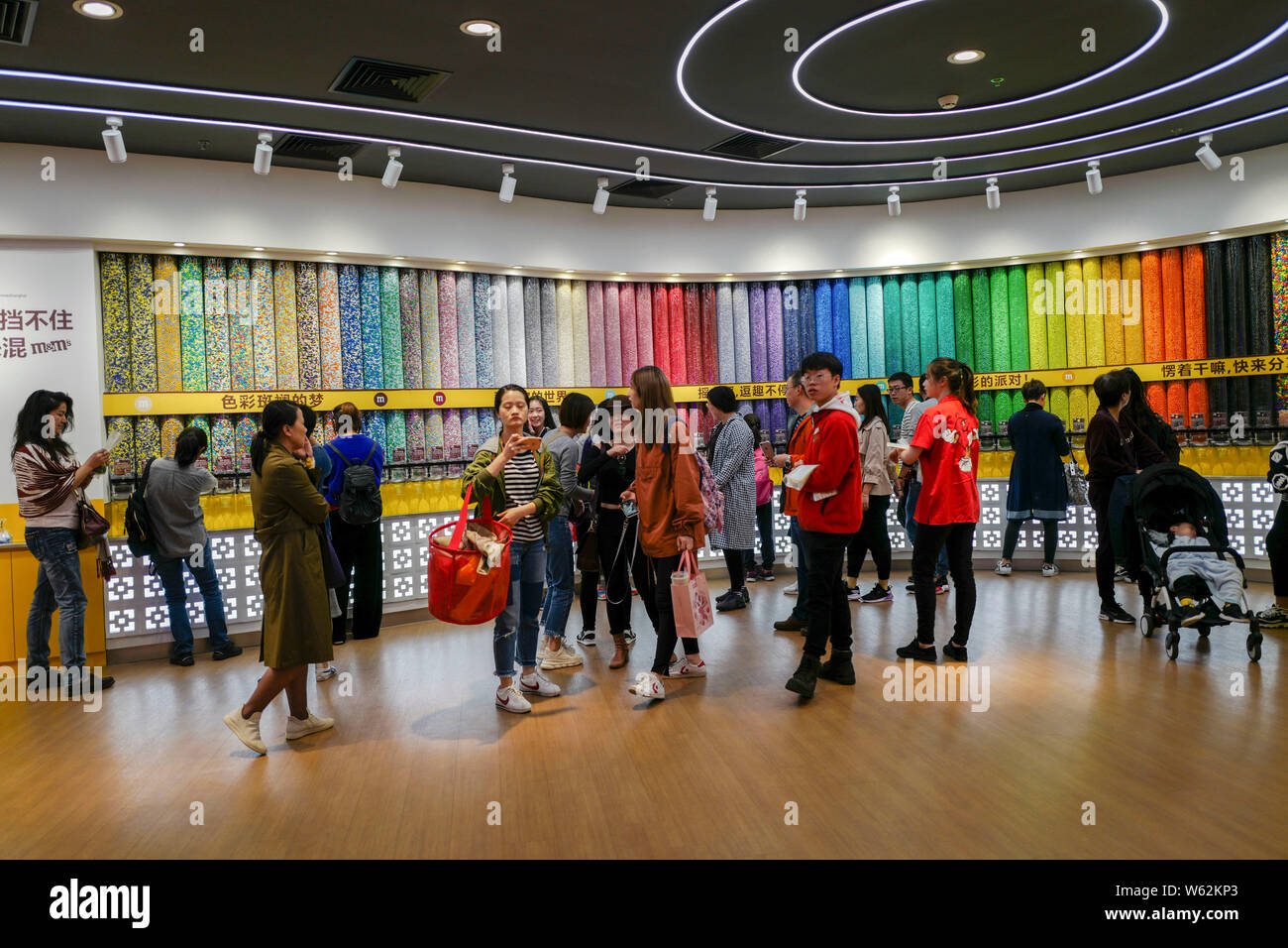 Customers visit the M&M's World flagship store in Shanghai, China, 19 ...