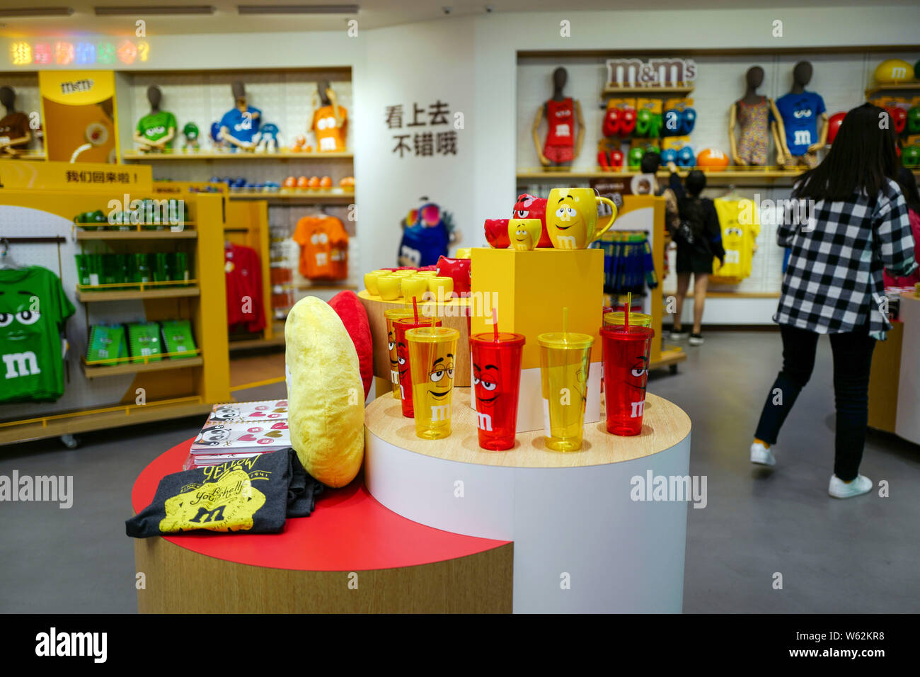 Customers visit the M&M's World flagship store in Shanghai, China, 19 ...