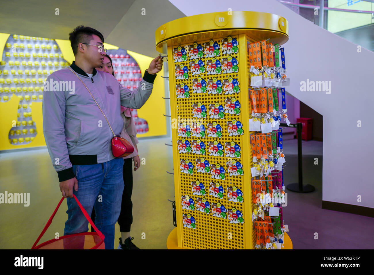 Customers visit the M&M's World flagship store in Shanghai, China, 19 ...