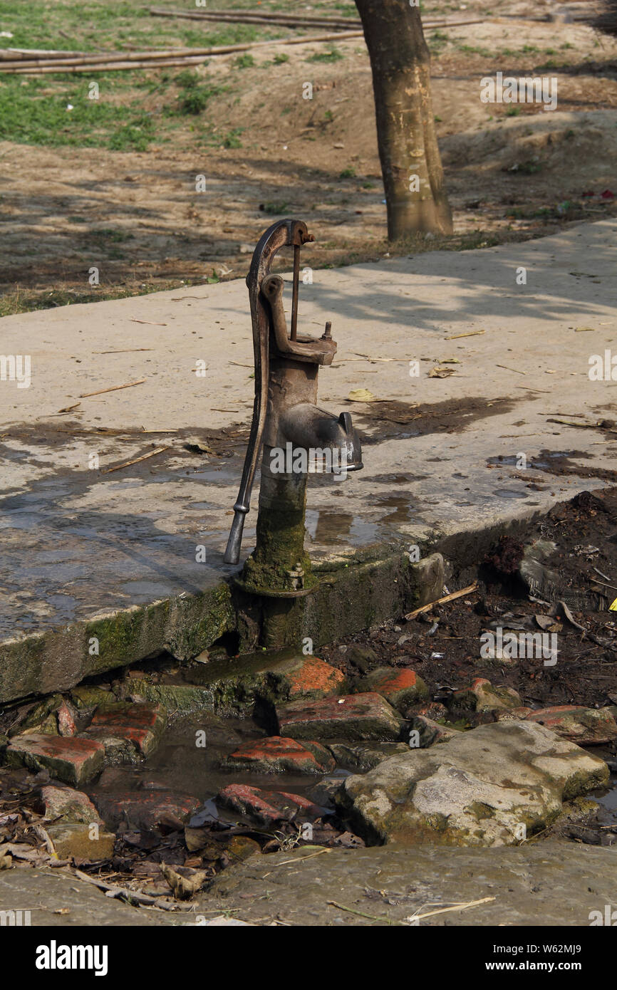 Indian village hand pump hi-res stock photography and images - Alamy