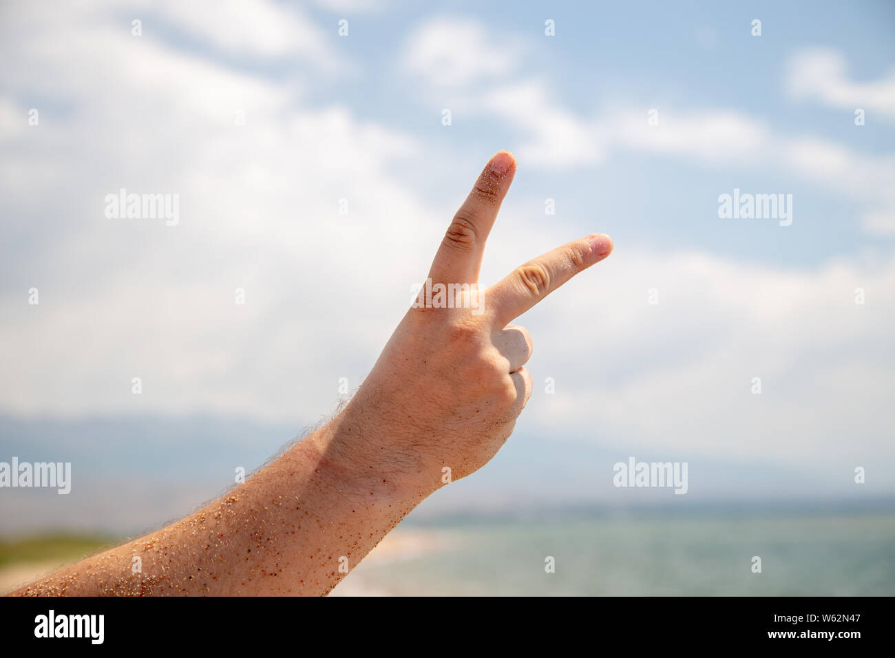 Woman shows fingers in hi-res stock photography and images - Alamy