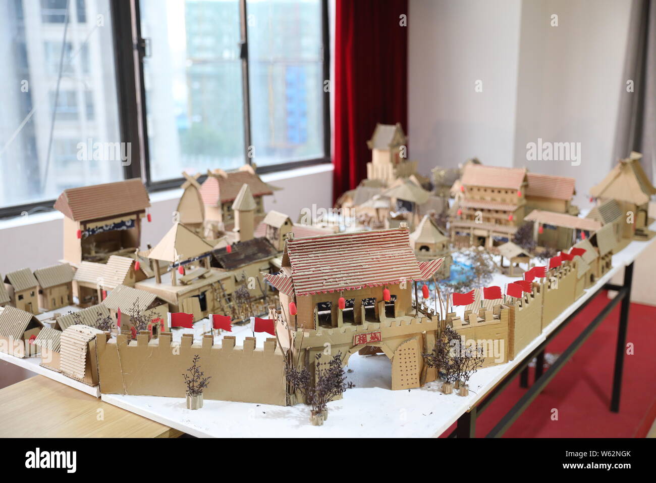 A scale model of an ancient city made of recycled package boxes by ...