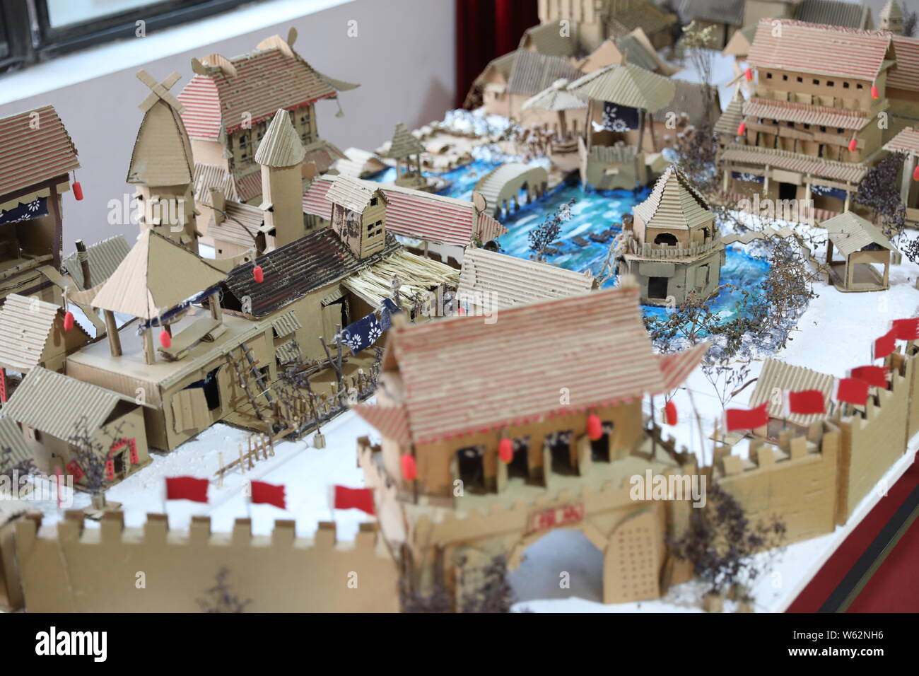 A scale model of an ancient city made of recycled package boxes by ...