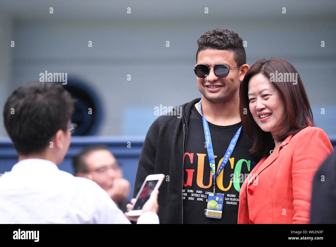 Brazilian football player Elkeson, center, of Shanghai SIPG F.C. is ...