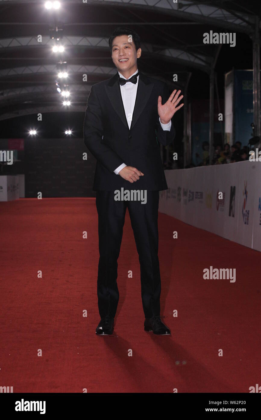 South Korean actor Kim Rae-won poses as he arrives on the red carpet ...