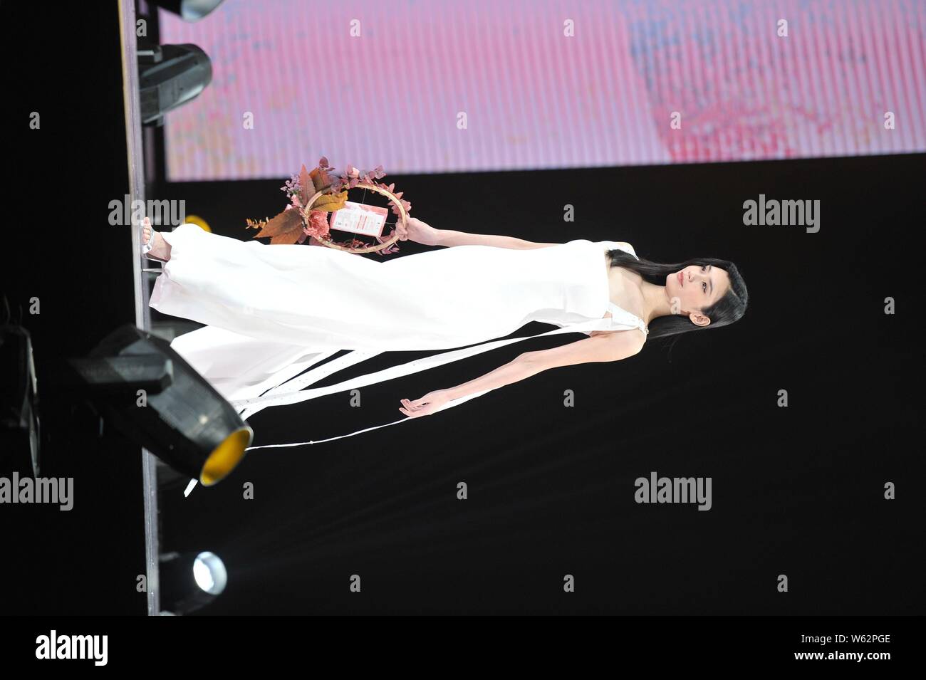 Victoria's Secret Angel and Chinese model Xi Mengyao, better known as Ming Xi, performs during ...