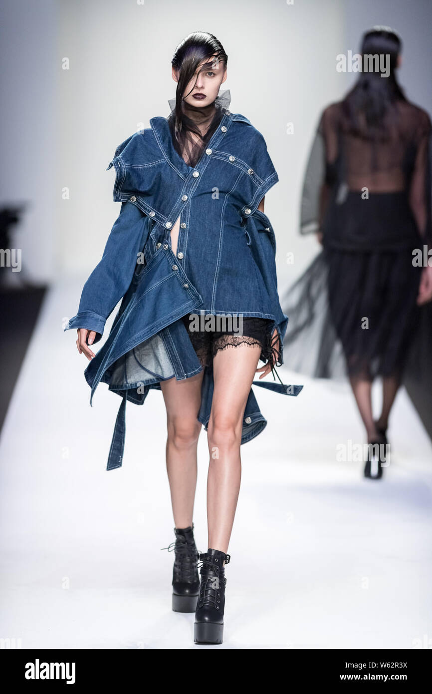 A model displays a new creation at the fashion show of DEVIL BEAUTY ...