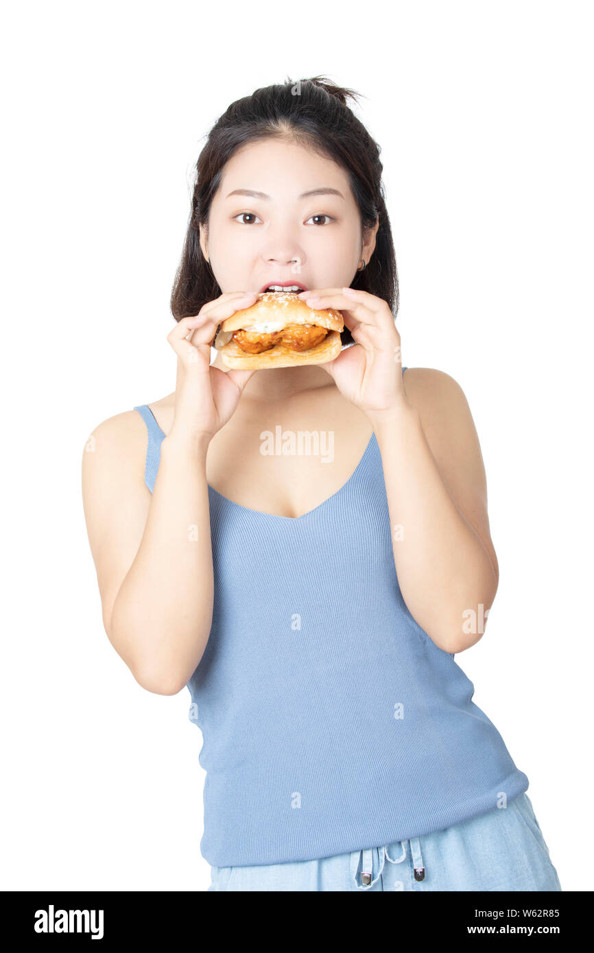 Person eating chicken dinner hi-res stock photography and images - Alamy