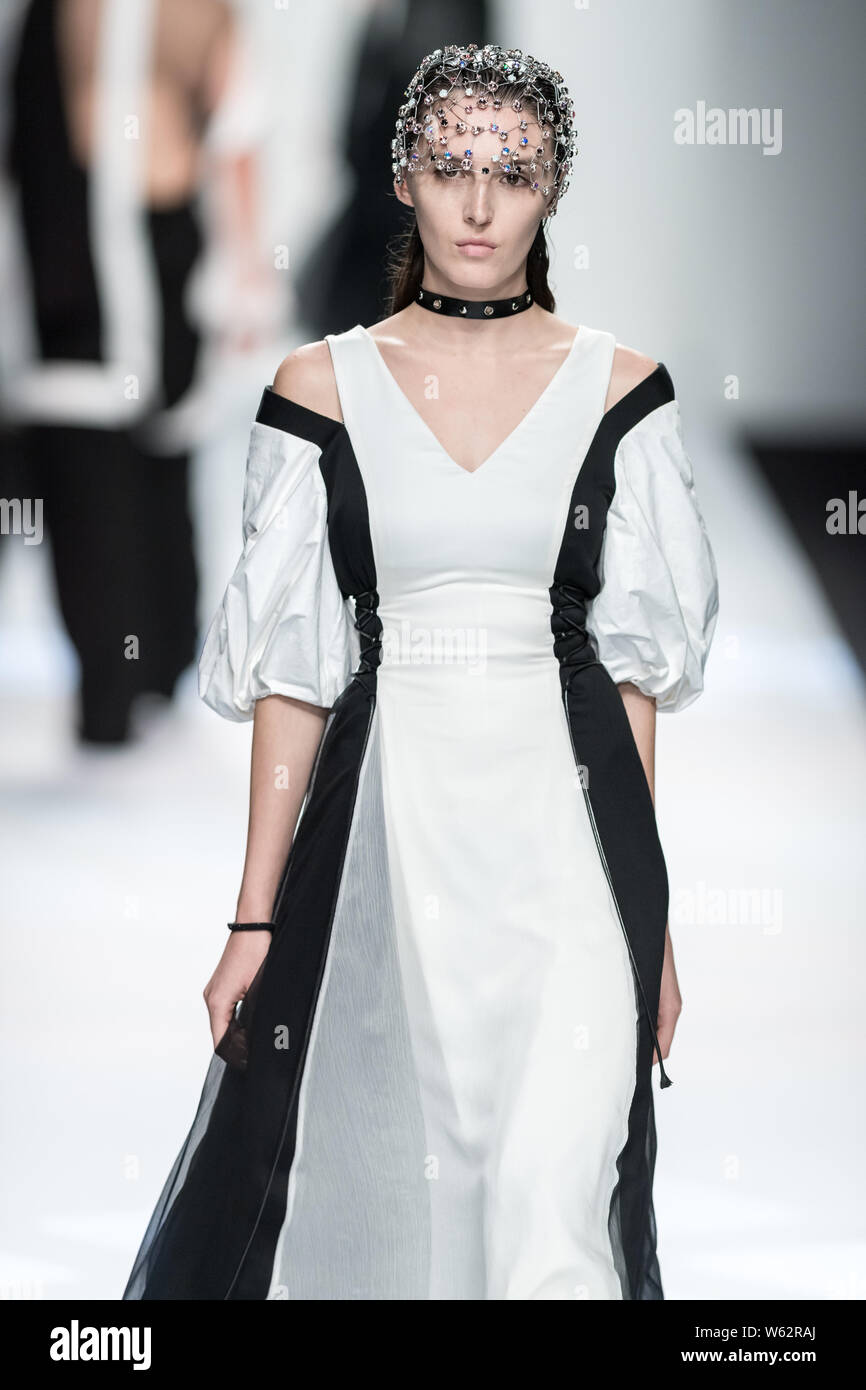 A model displays a new creation at the fashion show of DEVIL BEAUTY ...