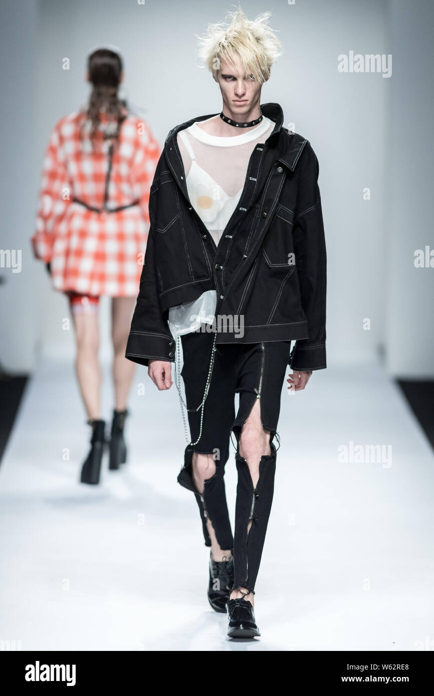 A model displays a new creation at the fashion show of DEVIL BEAUTY ...