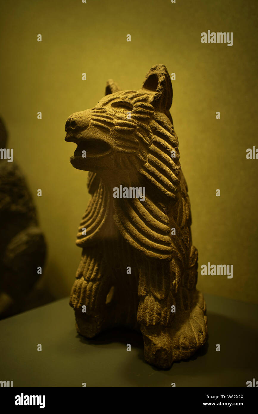 Coyote sculpture. A coyote is a small wolf which lives in the plains of ...