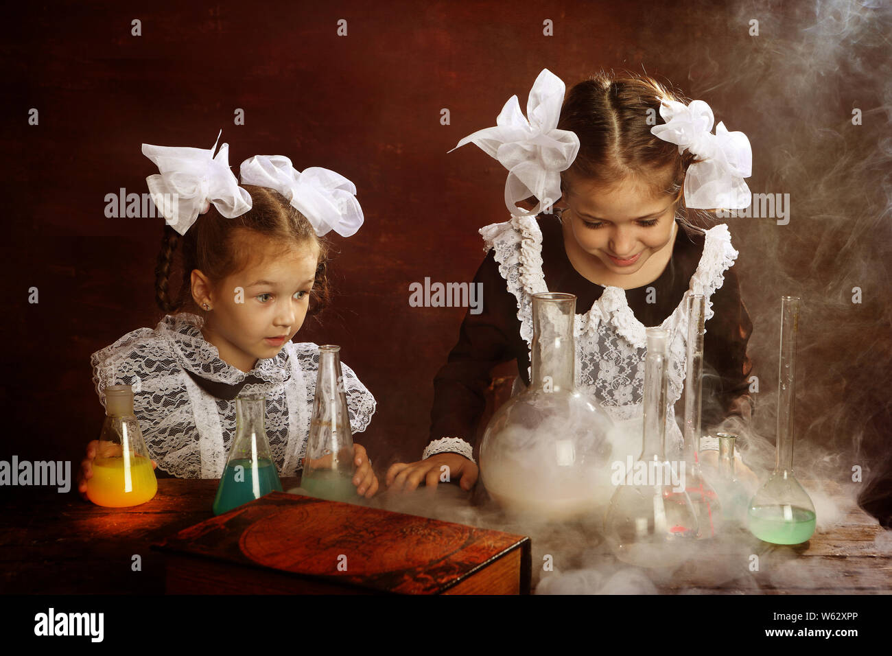 two children conduct experiments in the office of chemistry Stock Photo ...