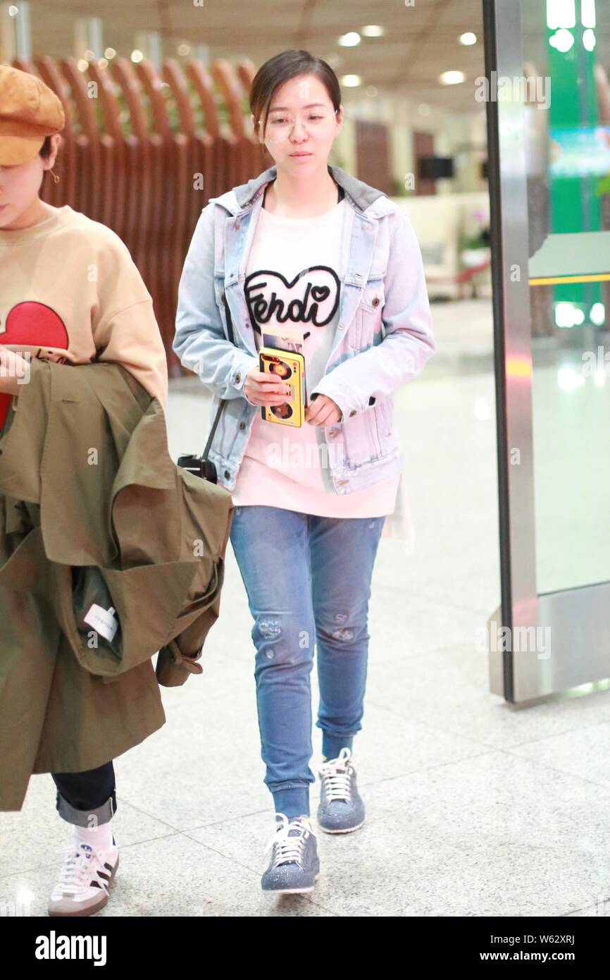 Chinese singer Jane Zhang or Zhang Liangying arrives at the Beijing ...