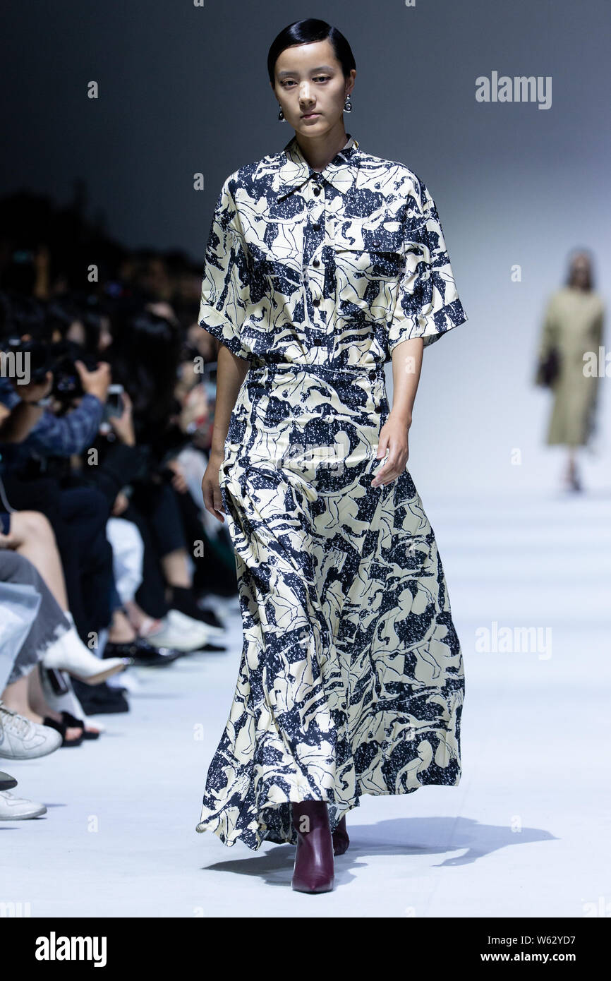 Chinese model Pei Bei displays a new creation at the fashion show of ...
