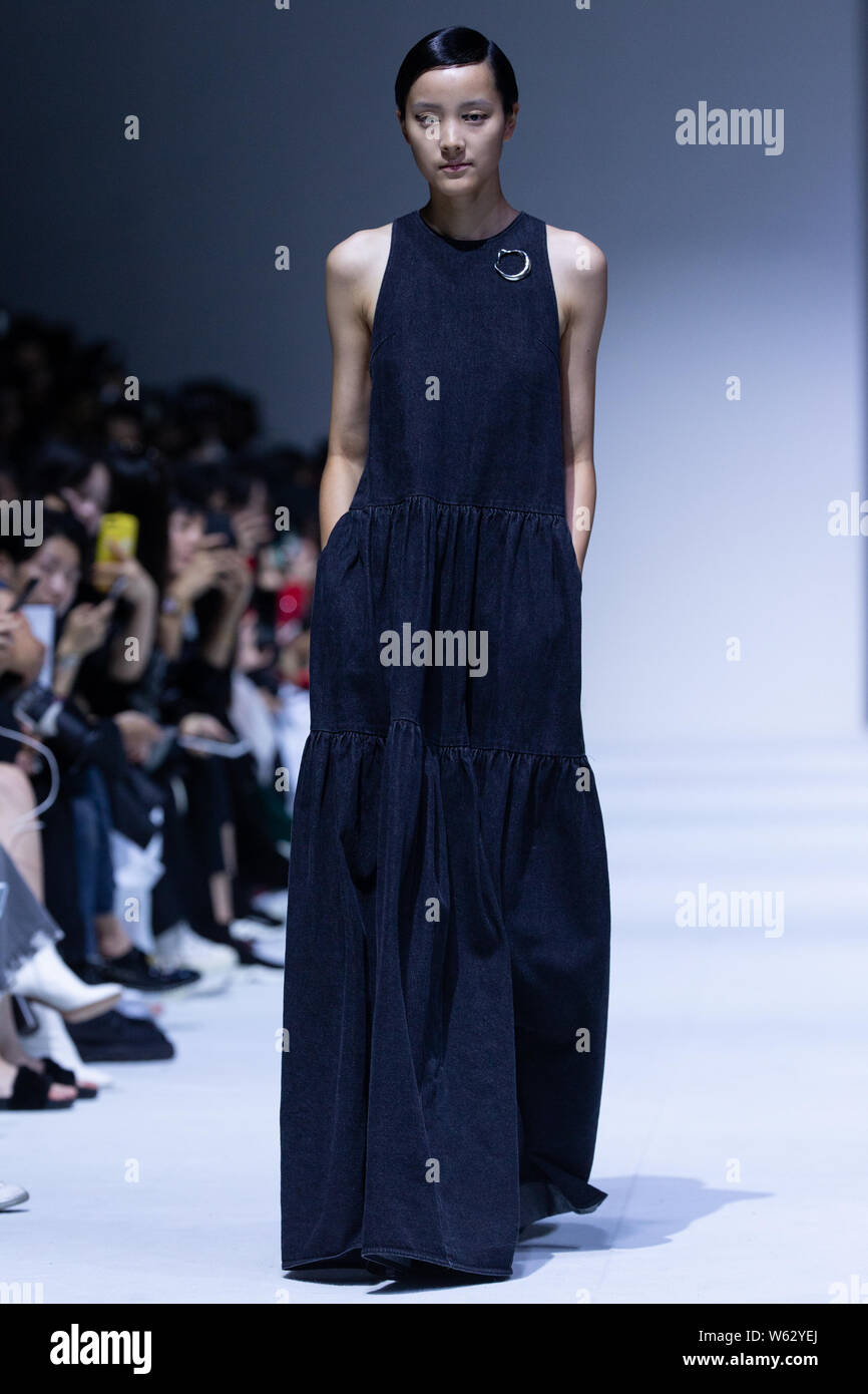 Chinese model Pei Bei displays a new creation at the fashion show of ...