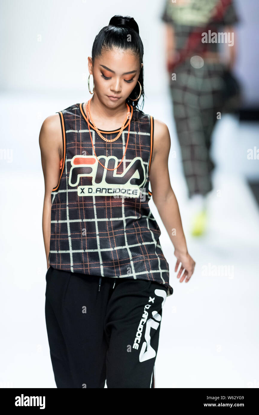 A model displays a new creation at the fashion show of D-Antidote during the Shanghai Fashion ...