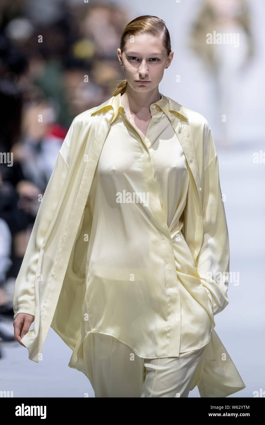 A model displays a new creation at the fashion show of IMMI during the ...