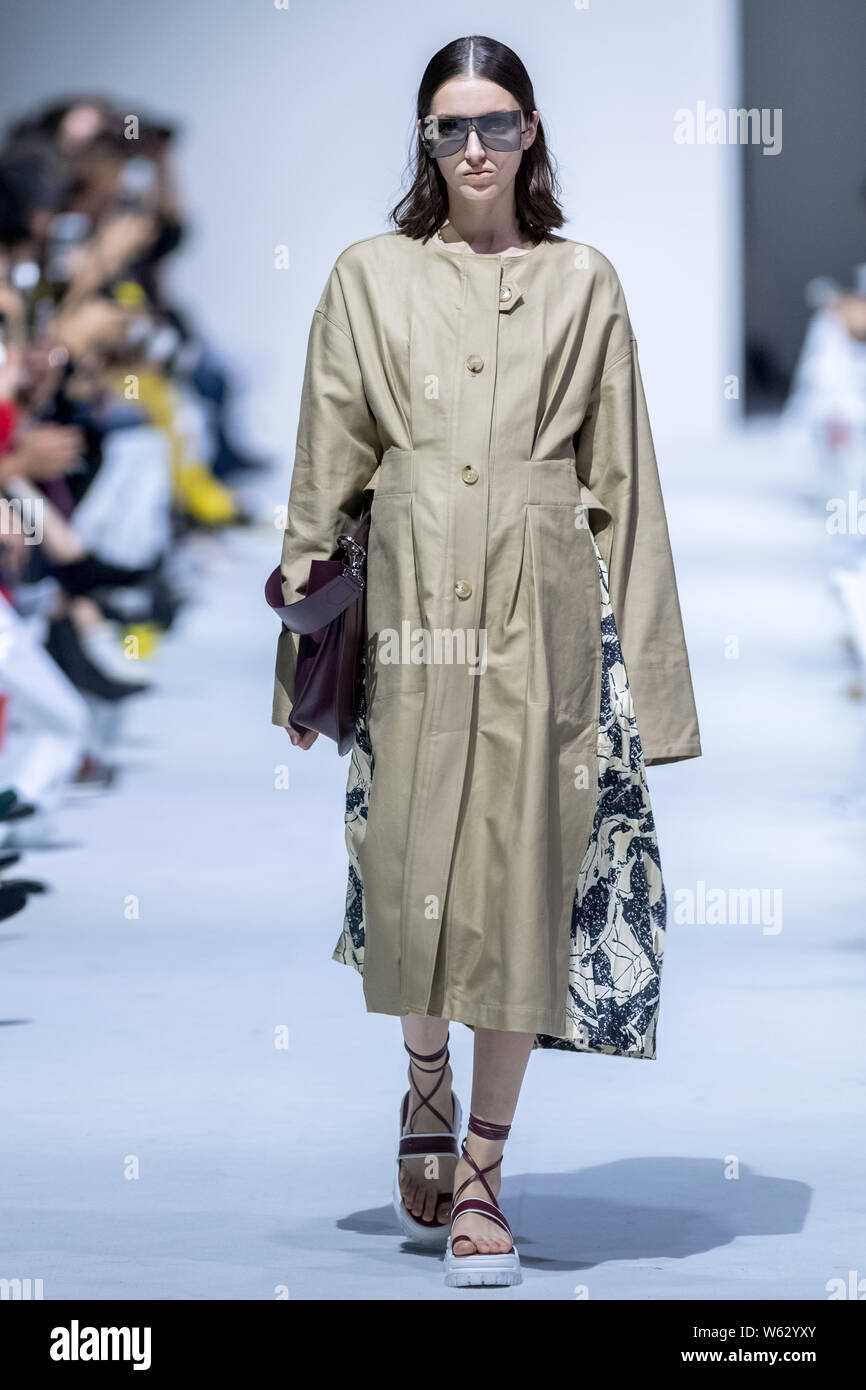 A model displays a new creation at the fashion show of IMMI during the ...