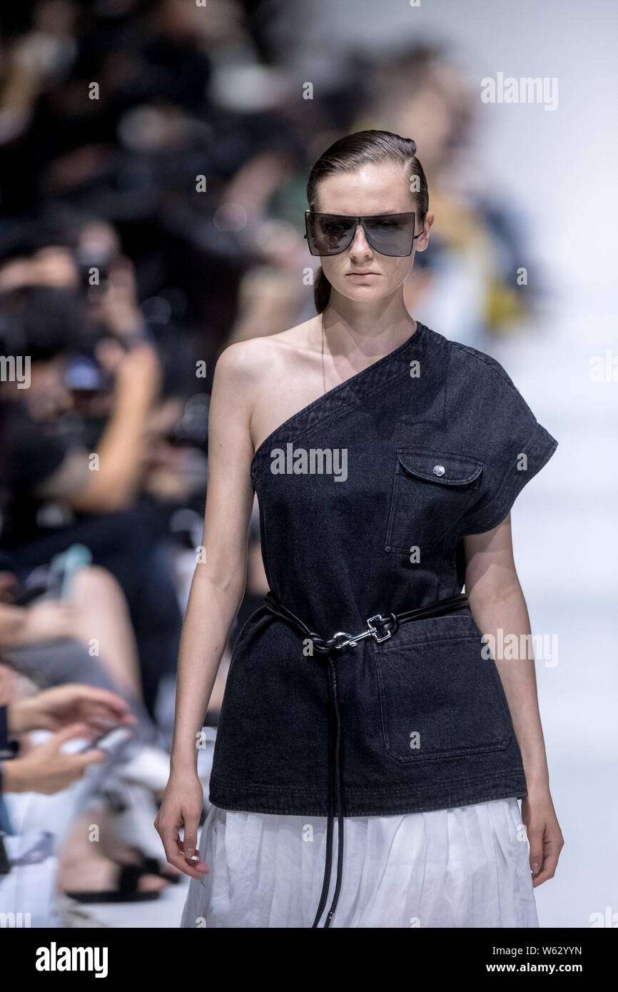 A model displays a new creation at the fashion show of IMMI during the ...