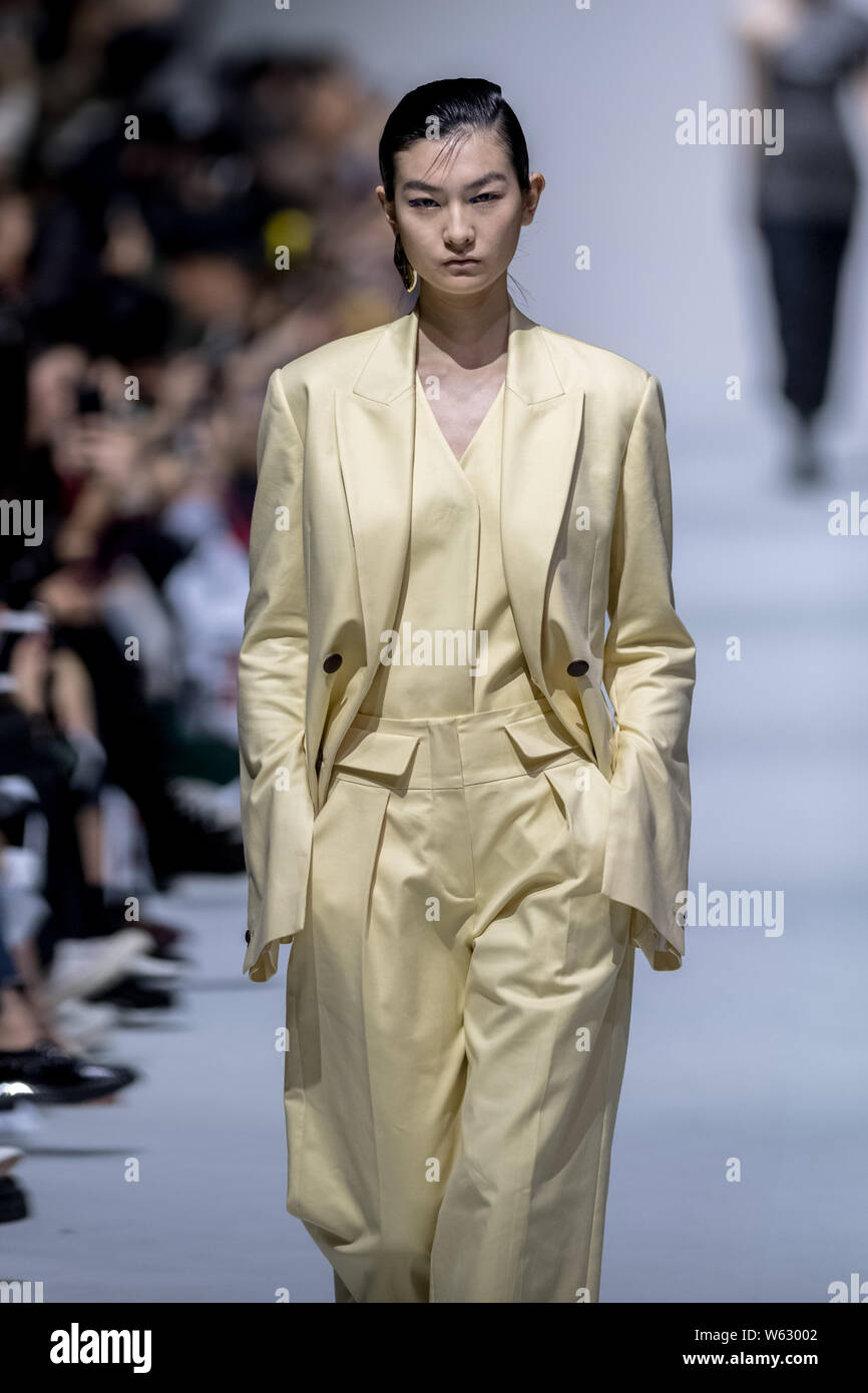 A model displays a new creation at the fashion show of IMMI during the ...