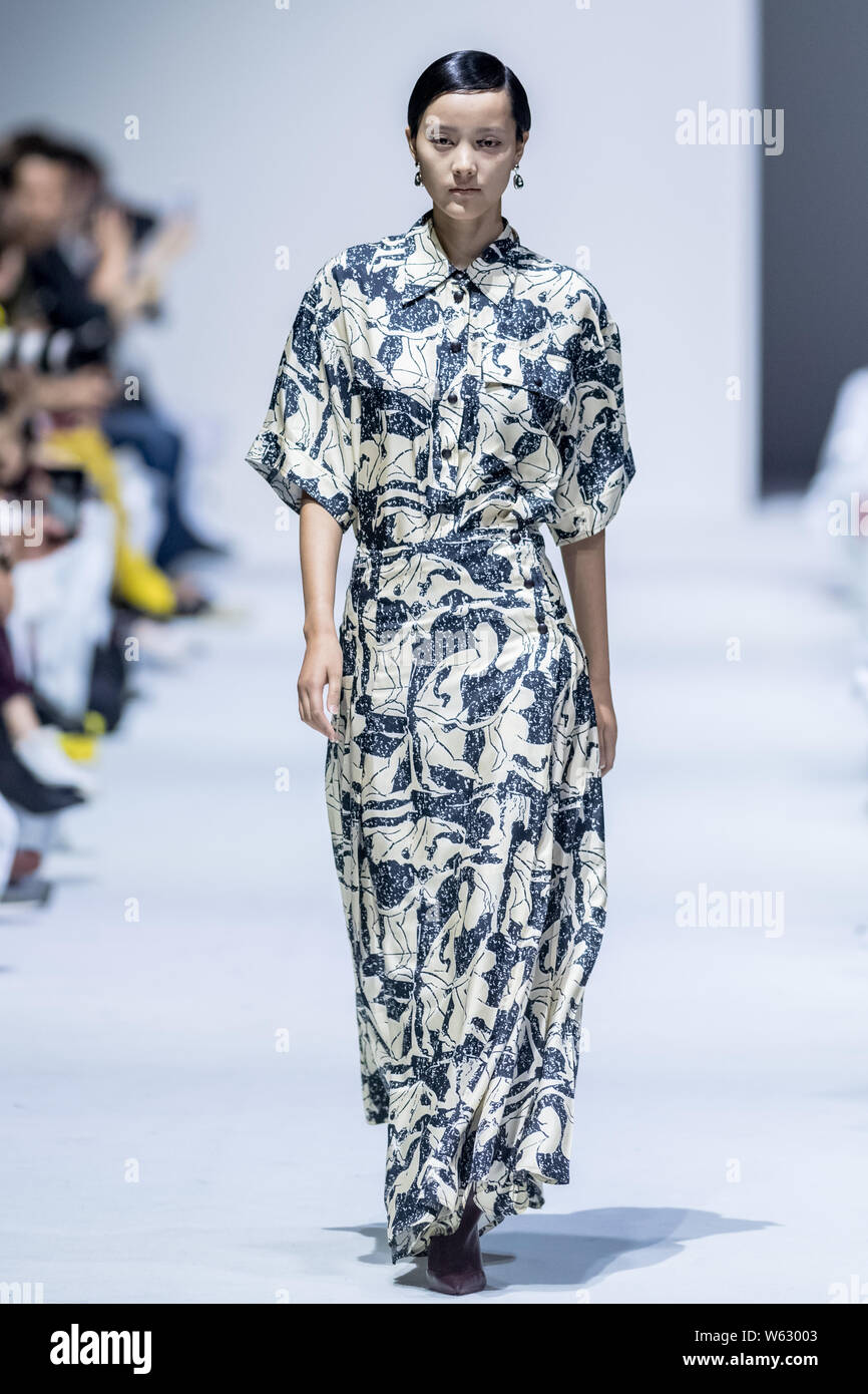 Chinese model Pei Bei displays a new creation at the fashion show of ...