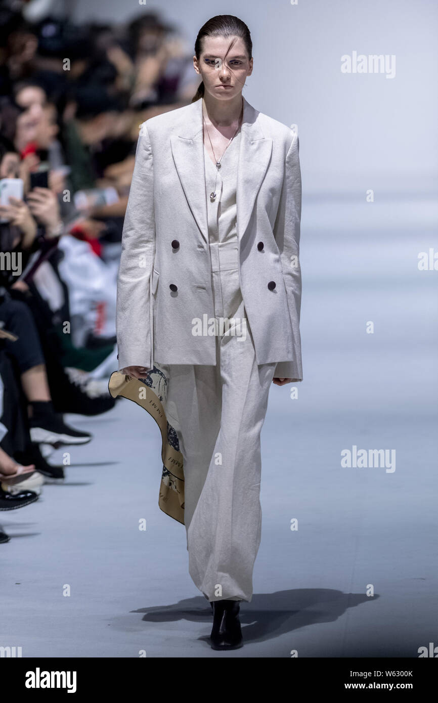 A model displays a new creation at the fashion show of IMMI during the ...