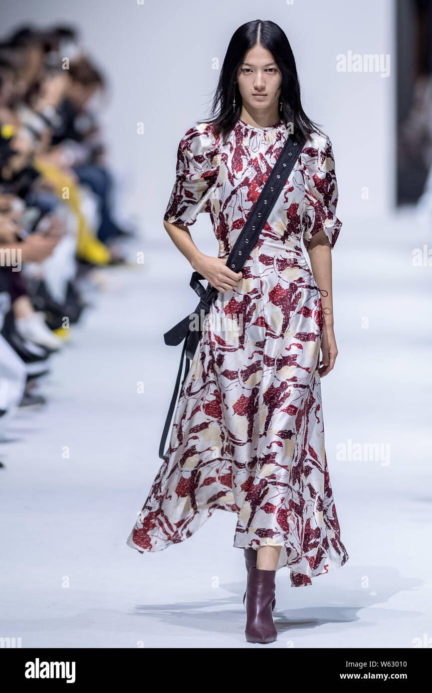 A model displays a new creation at the fashion show of IMMI during the ...