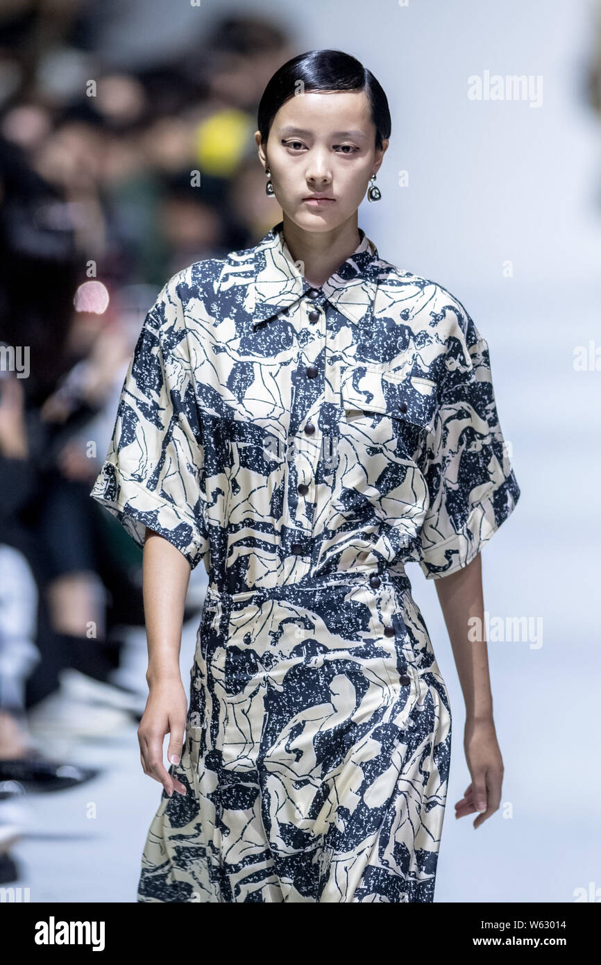 Chinese model Pei Bei displays a new creation at the fashion show of ...