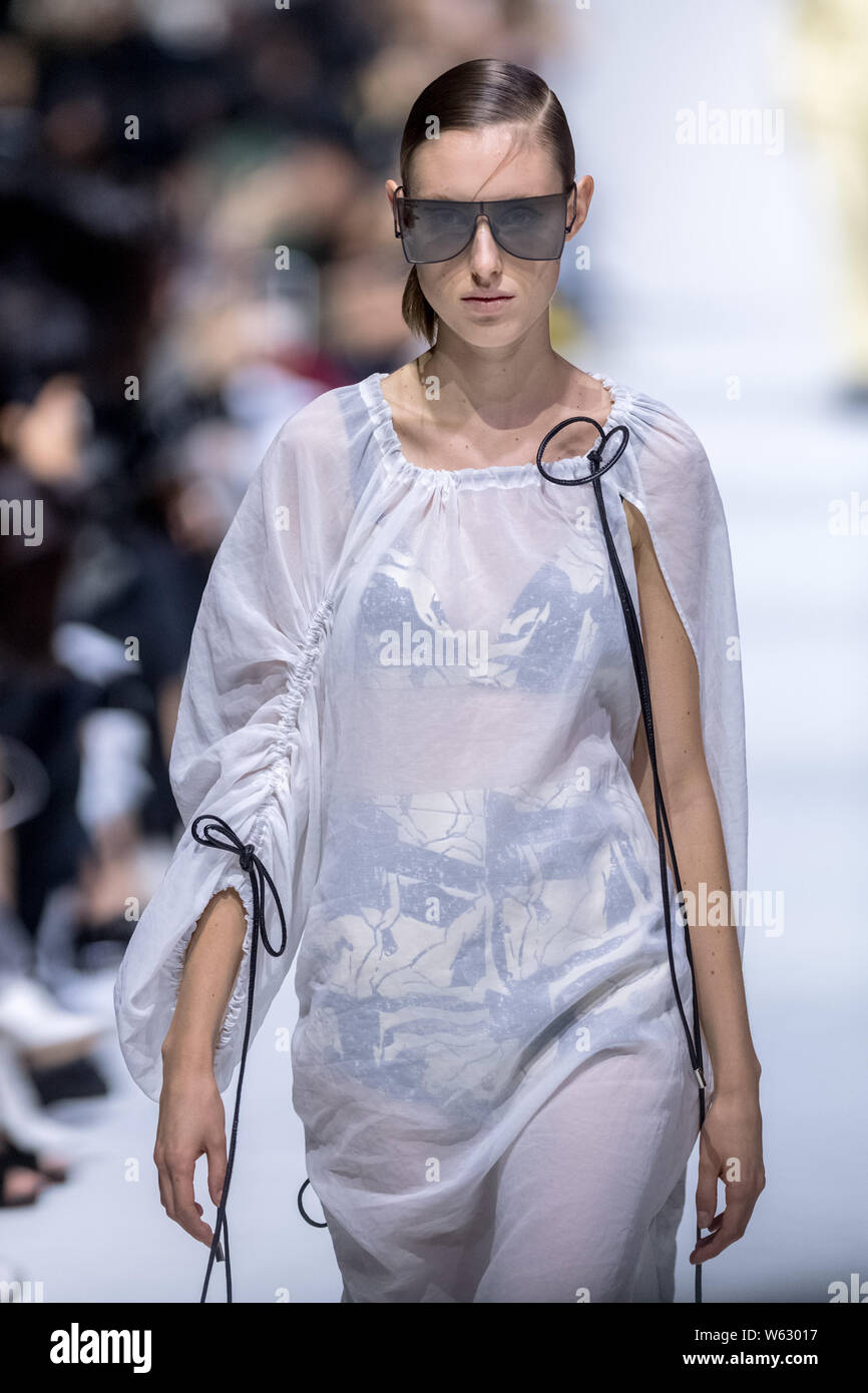 A model displays a new creation at the fashion show of IMMI during the ...