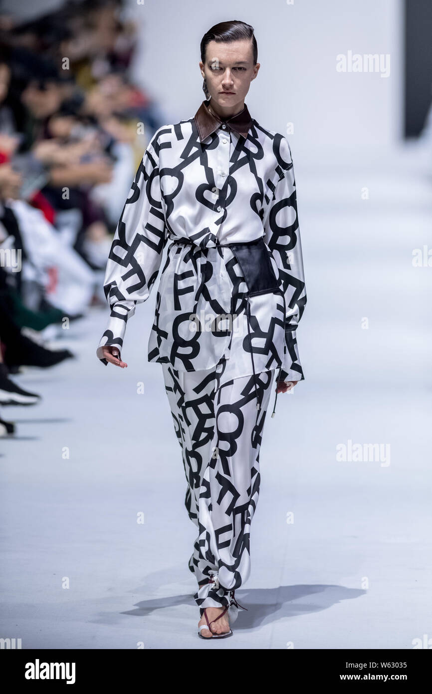A model displays a new creation at the fashion show of IMMI during the ...