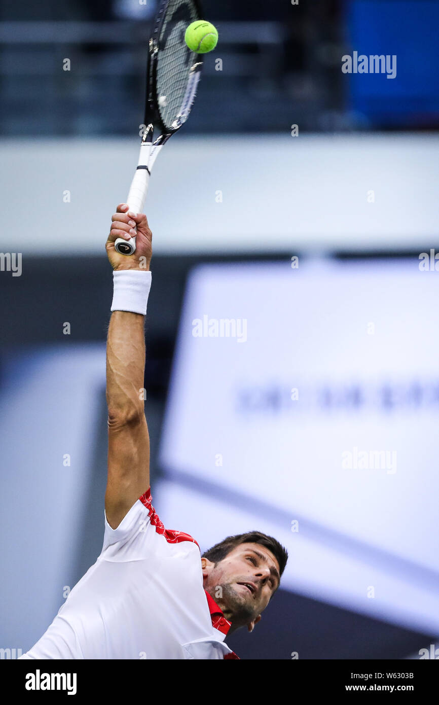 Novak Djokovic of Serbia serves against Borna Coric of Croatia in their ...