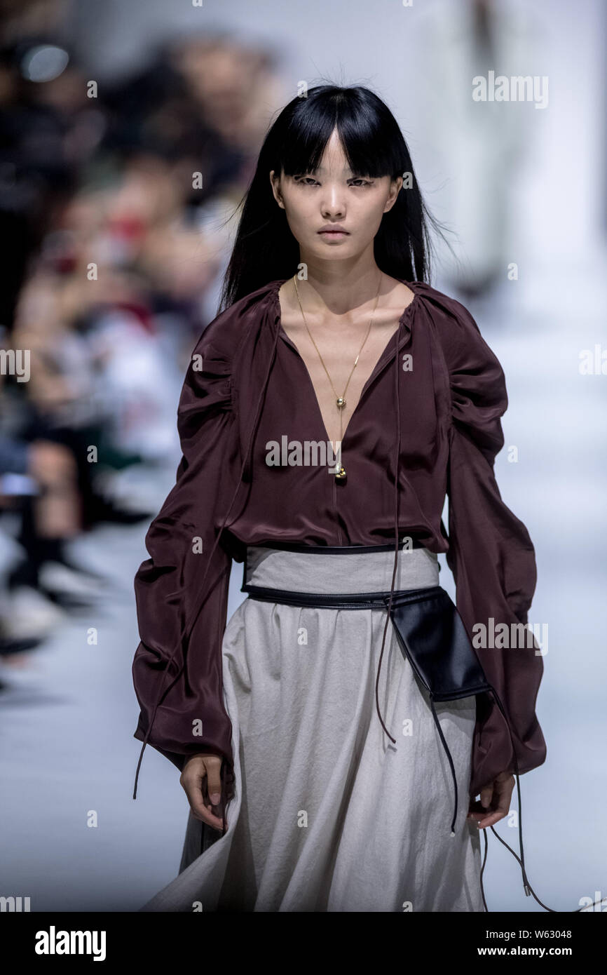 A model displays a new creation at the fashion show of IMMI during the ...