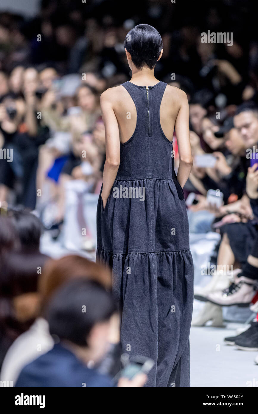Chinese model Pei Bei displays a new creation at the fashion show of ...