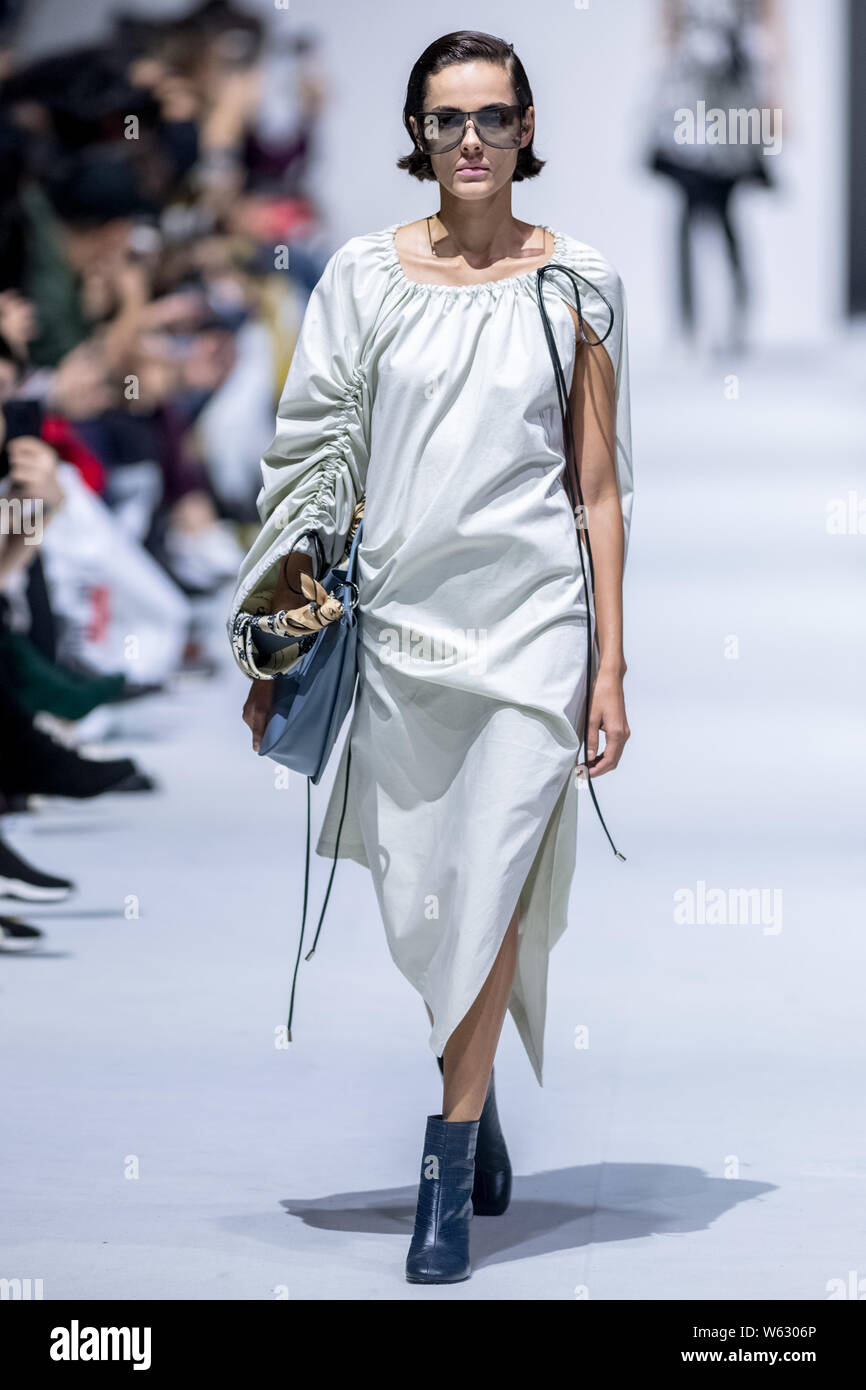 A model displays a new creation at the fashion show of IMMI during the ...