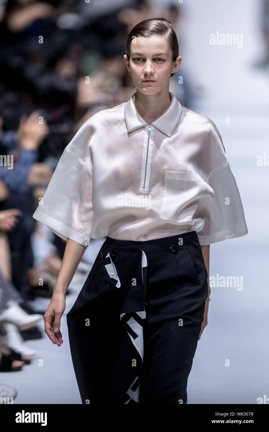 A model displays a new creation at the fashion show of IMMI during the ...